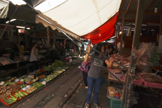 Watch where you walk in the Mae Klong market