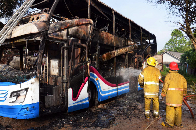Fire destroys two tour buses