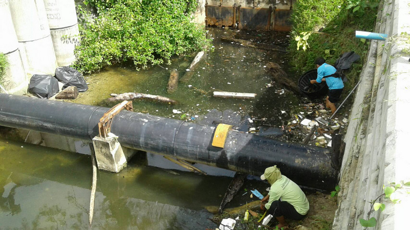 Trash-clogged canal near Phuket beach cleared