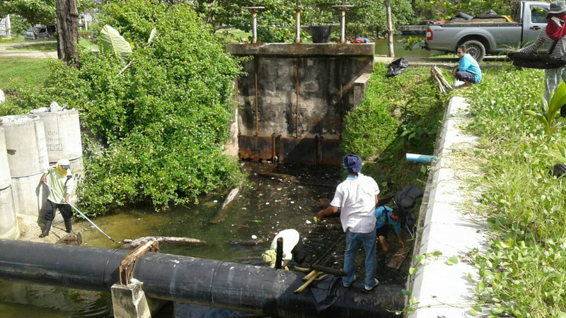 Trash-clogged canal near Phuket beach cleared